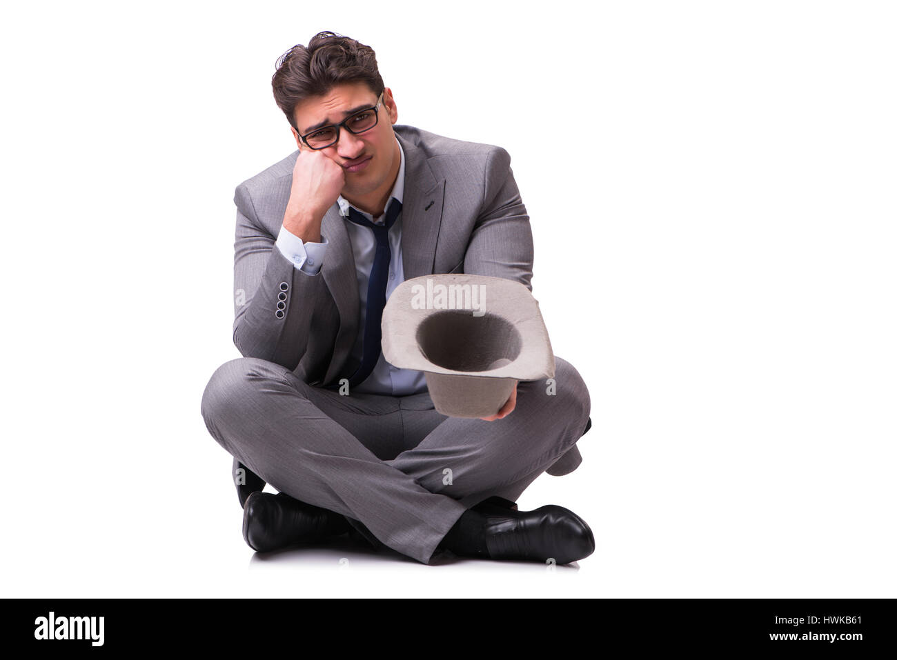 Bankrupt businessman isolated on white background Stock Photo - Alamy