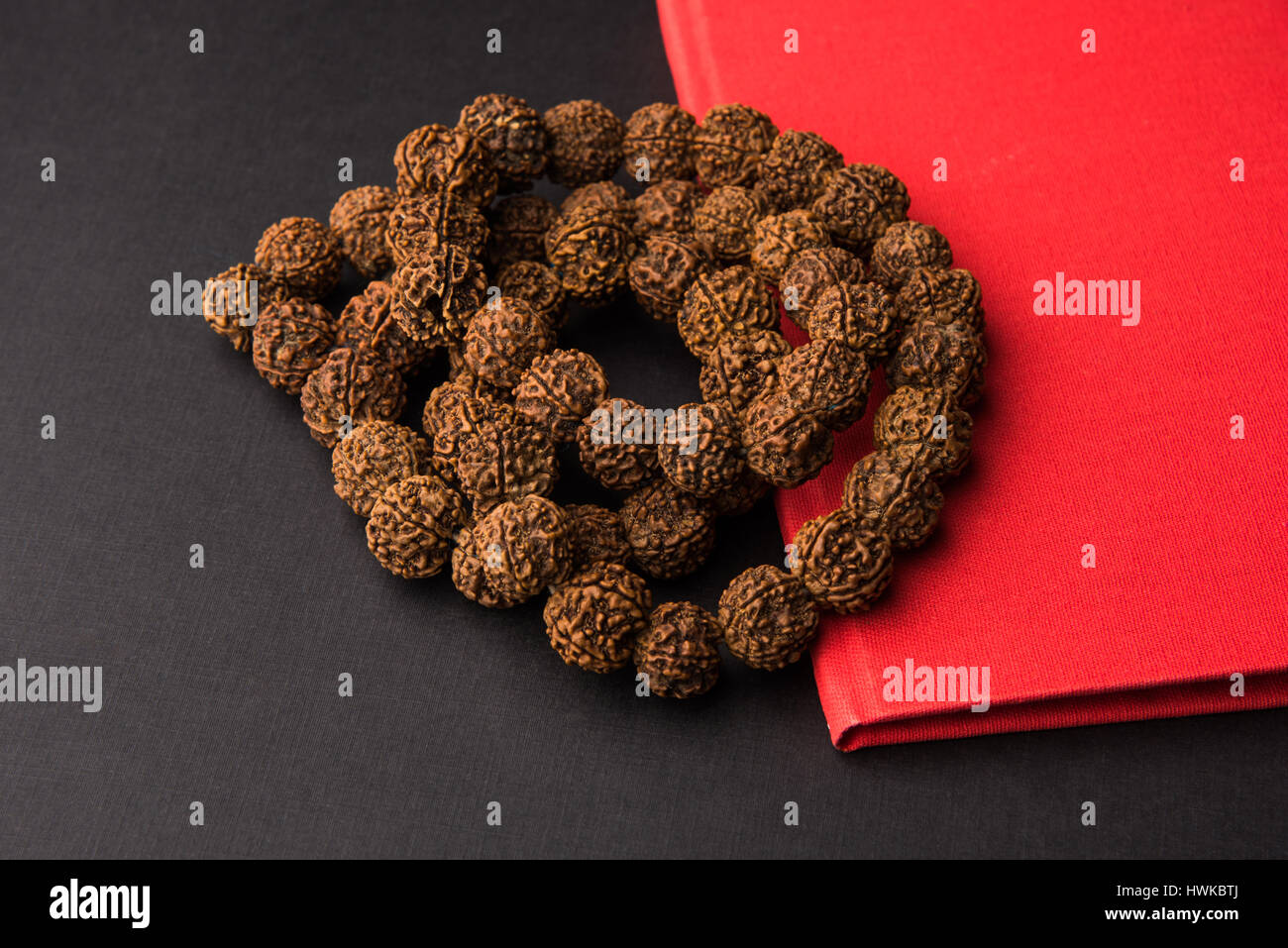 closeup picture of hand while doing Meditation with rudraksha mala or ...