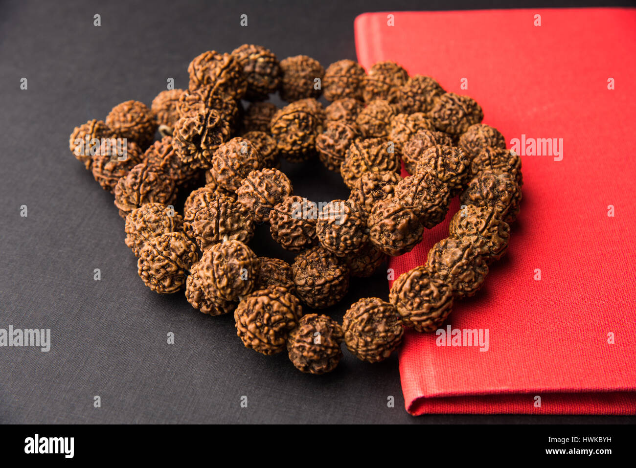 closeup picture of hand while doing Meditation with rudraksha mala or ...
