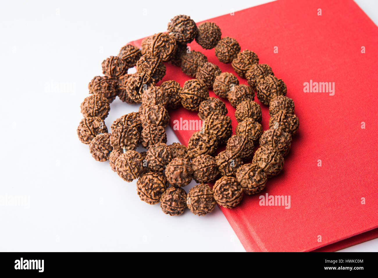 closeup picture of hand while doing Meditation with rudraksha mala or ...