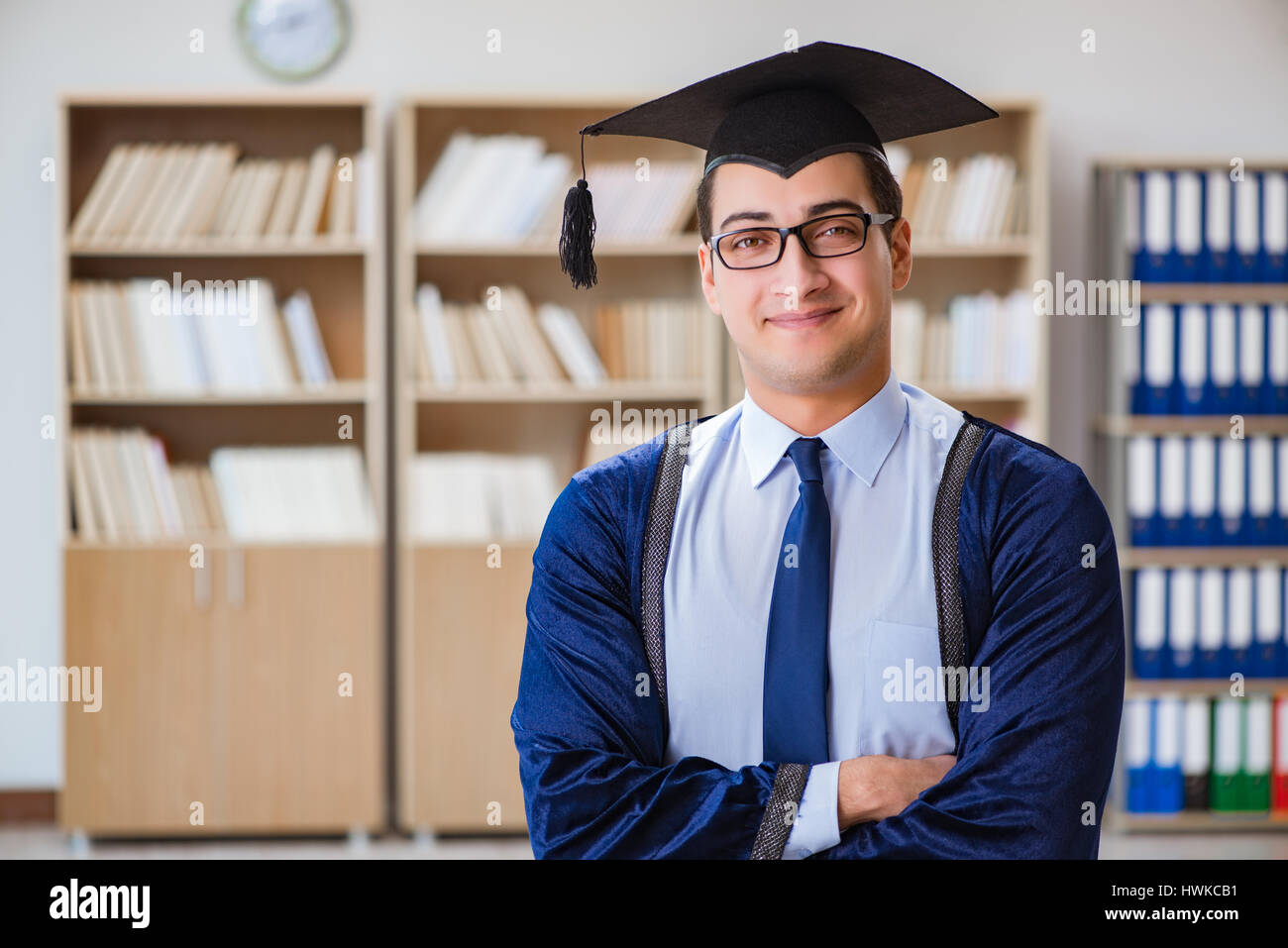 Young man graduating from university Stock Photo - Alamy