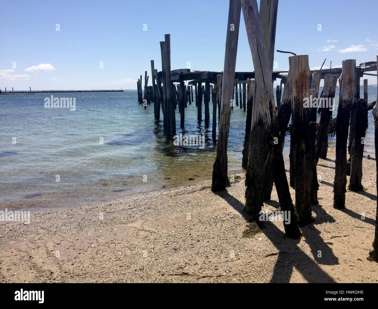 old ruined dock on the beach in Provincetown Stock Photo - Alamy