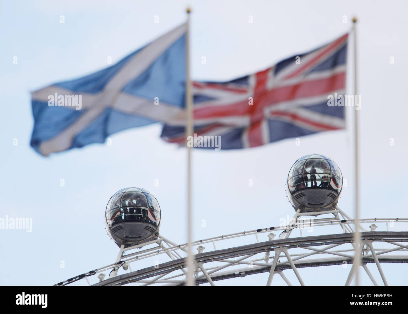 A Saltire flag and a Union flag flying above the London Eye in ...