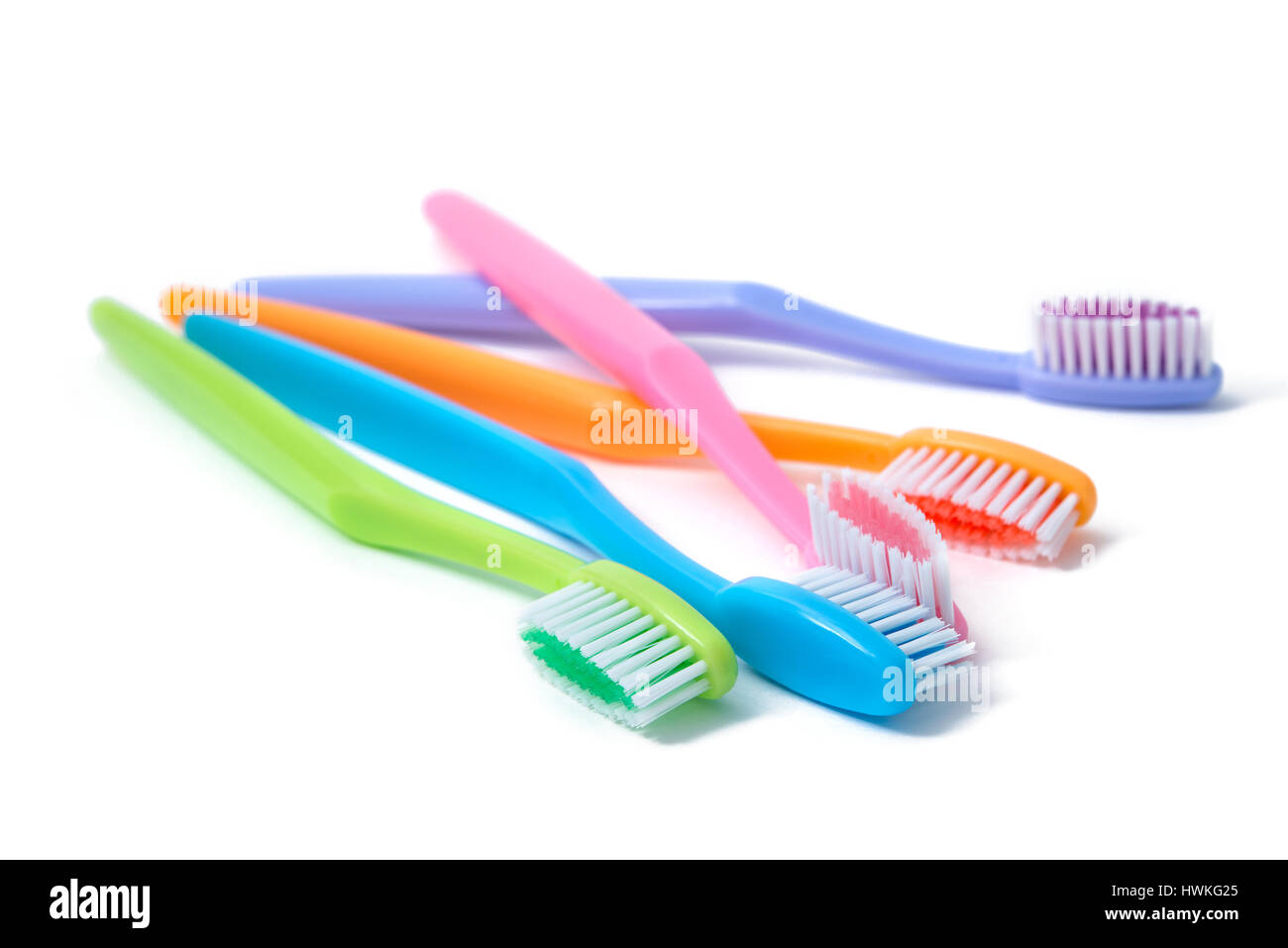 colorful toothbrushes isolated on white Stock Photo - Alamy