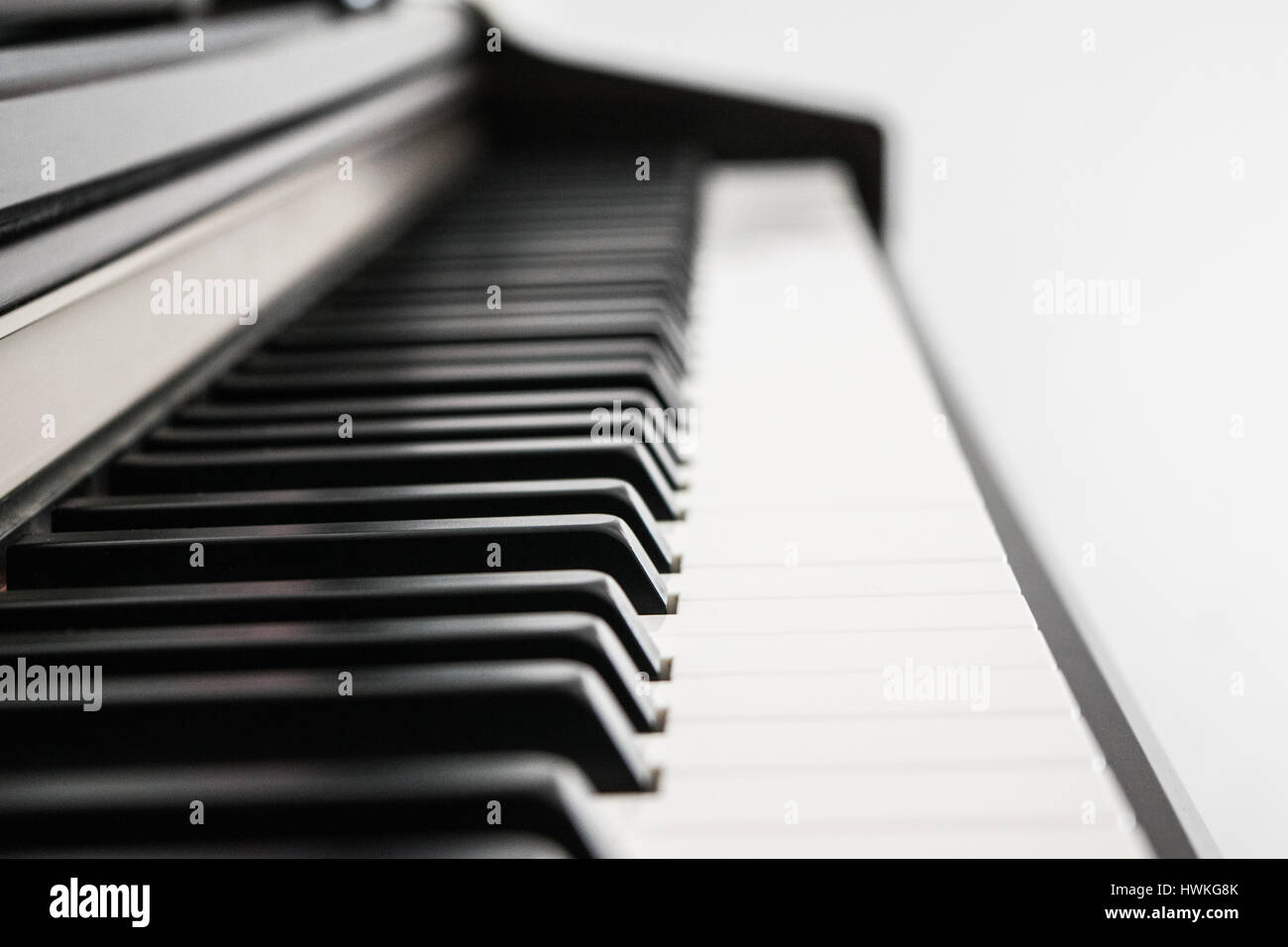 Piano keys side view Stock Photo - Alamy
