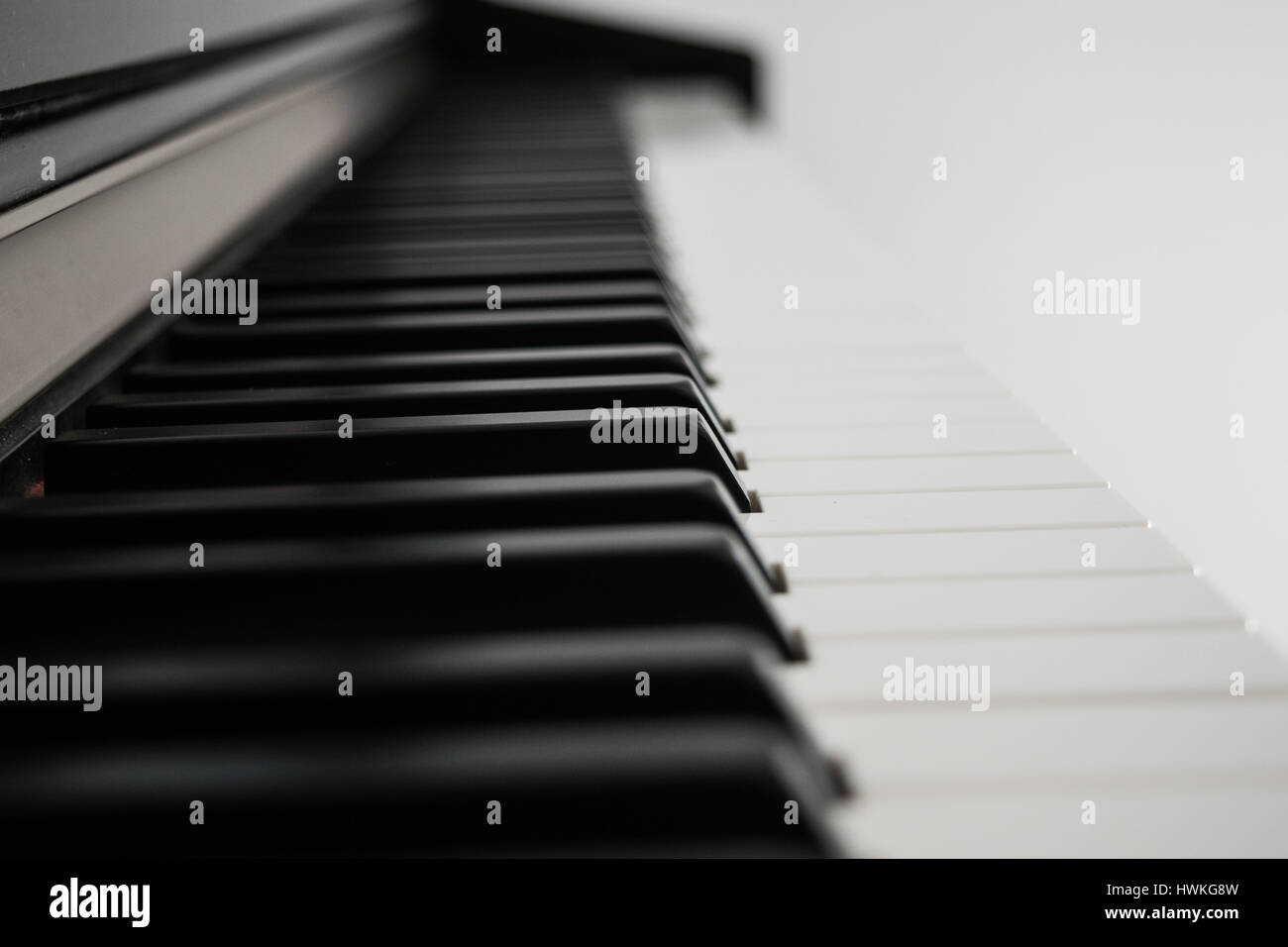 Piano keys side view Stock Photo - Alamy