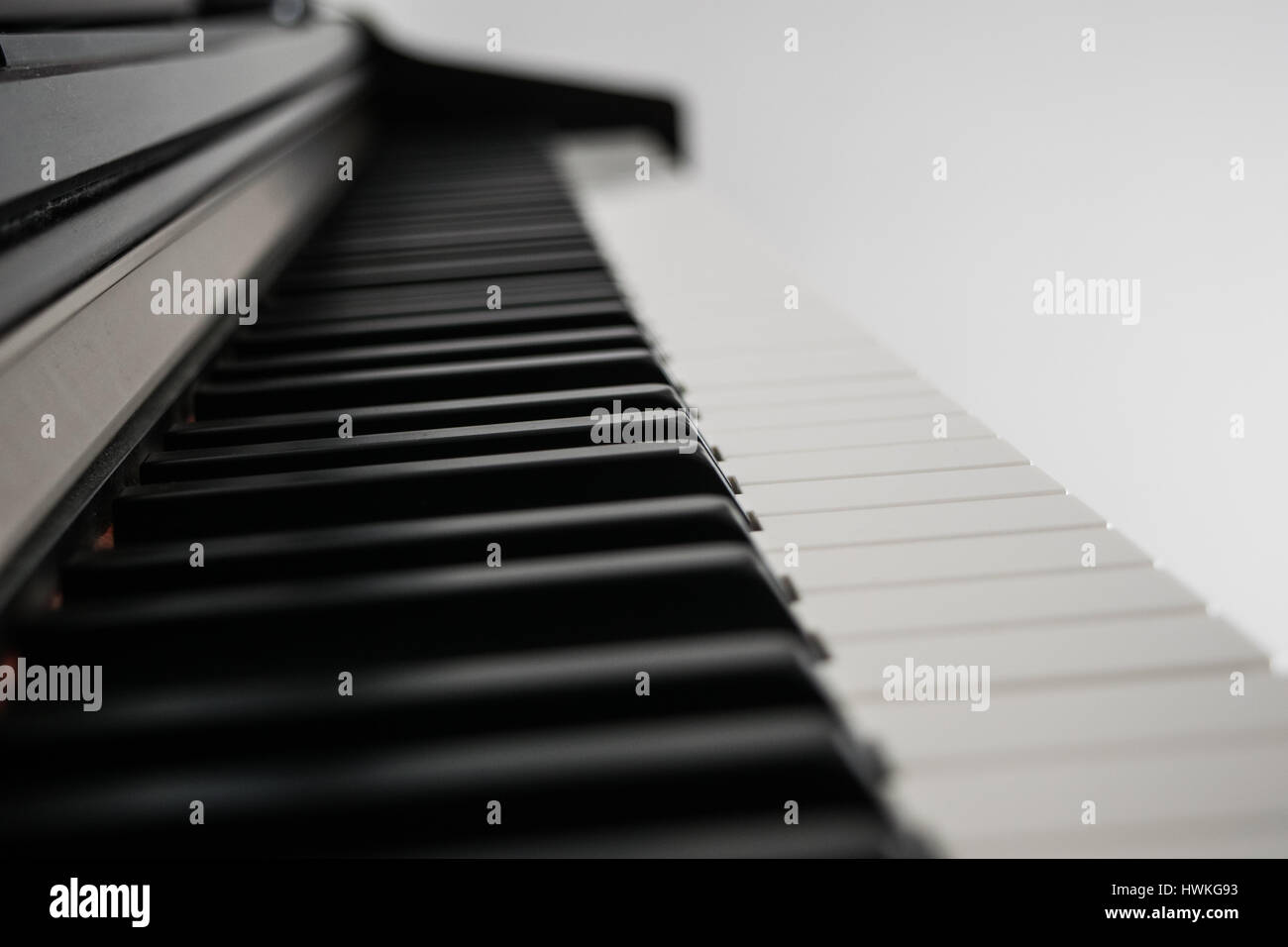 Piano keys side view Stock Photo - Alamy