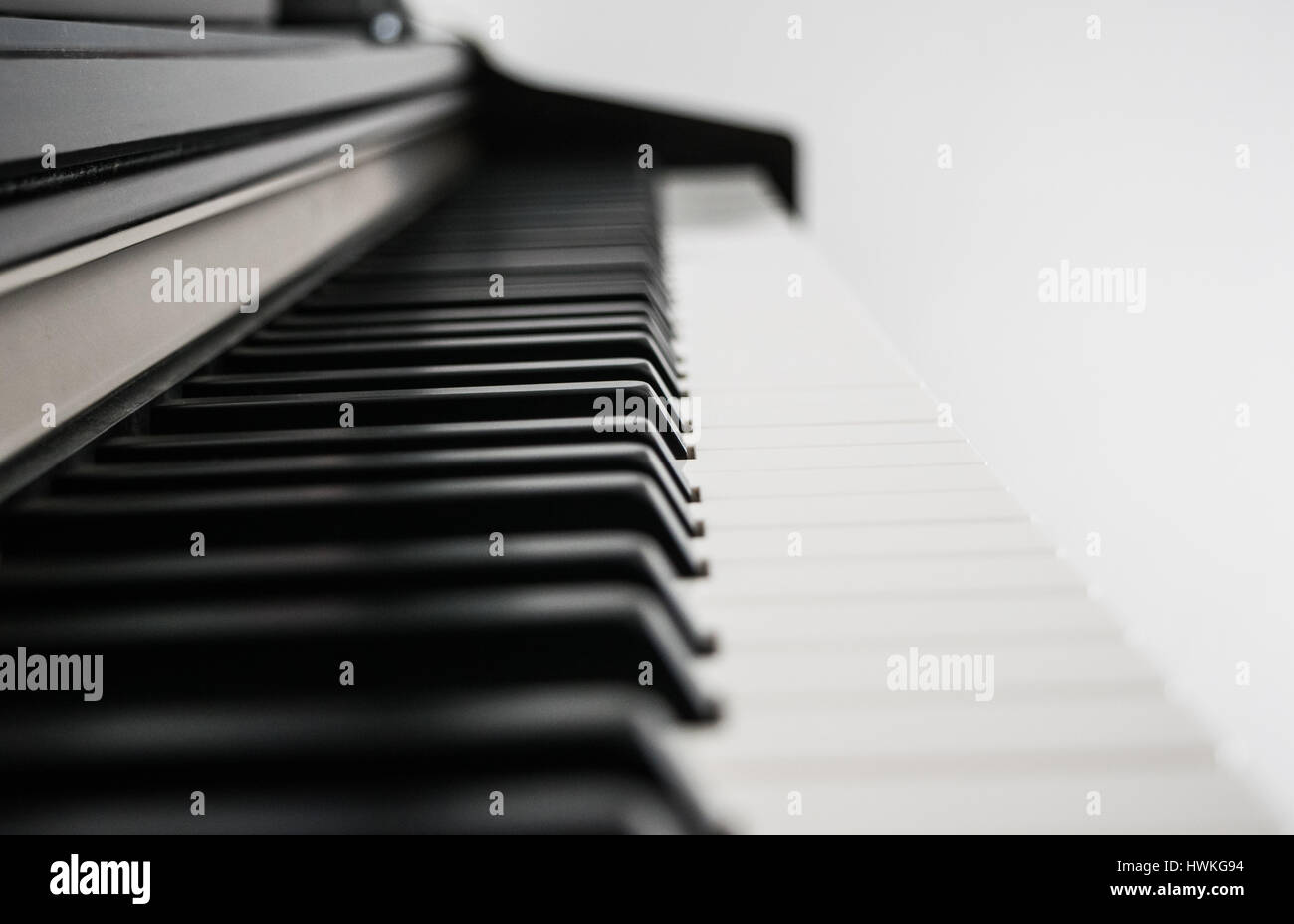 Piano keys side view Stock Photo - Alamy