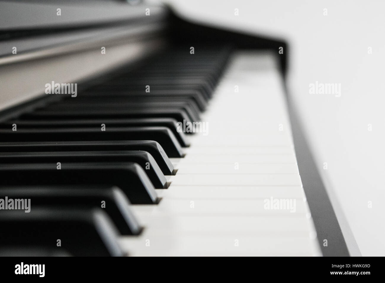 Piano keys side view Stock Photo - Alamy