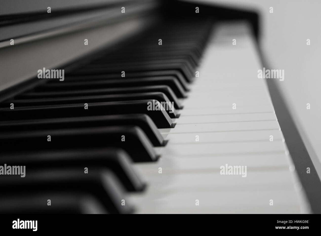 Piano keys side view Stock Photo - Alamy