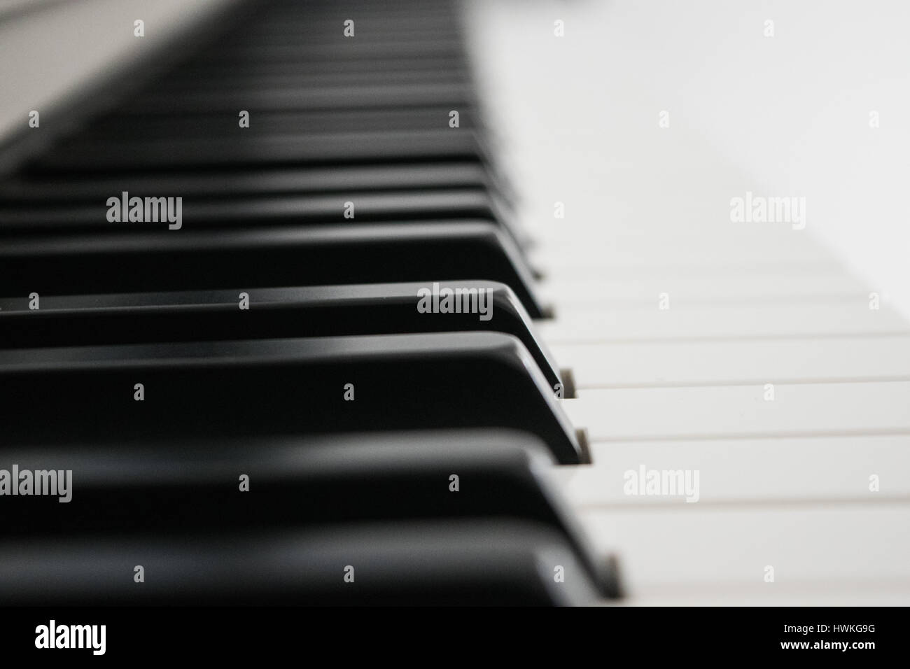 Piano keys side view Stock Photo - Alamy