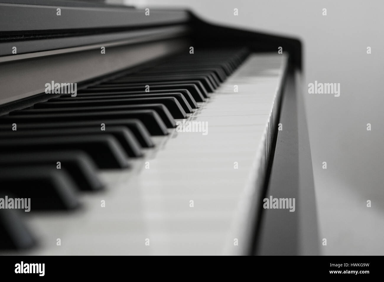 Piano keys side view Stock Photo - Alamy