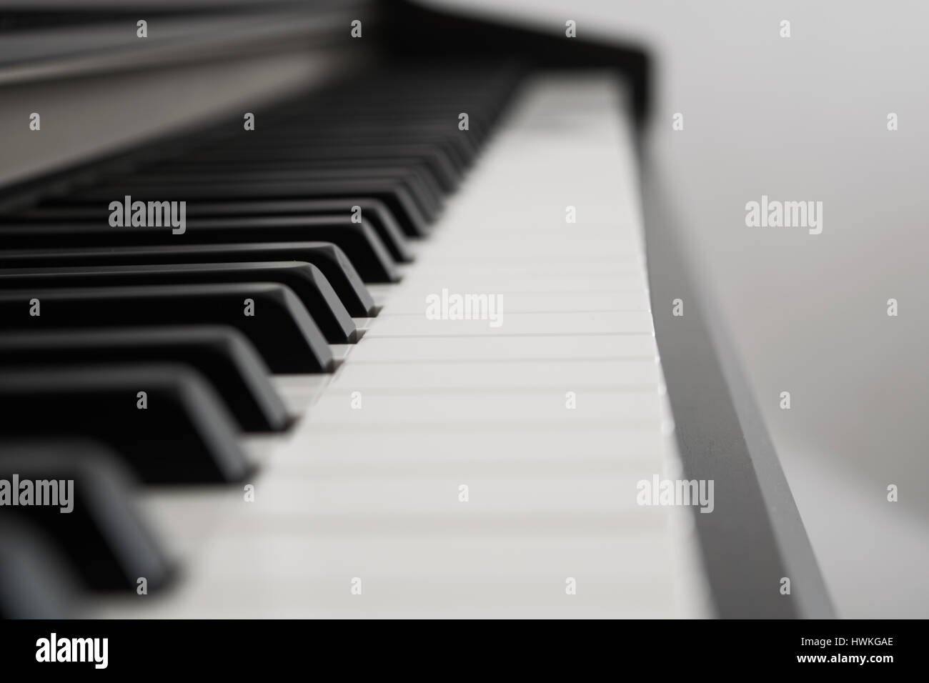 Piano keys side view Stock Photo - Alamy