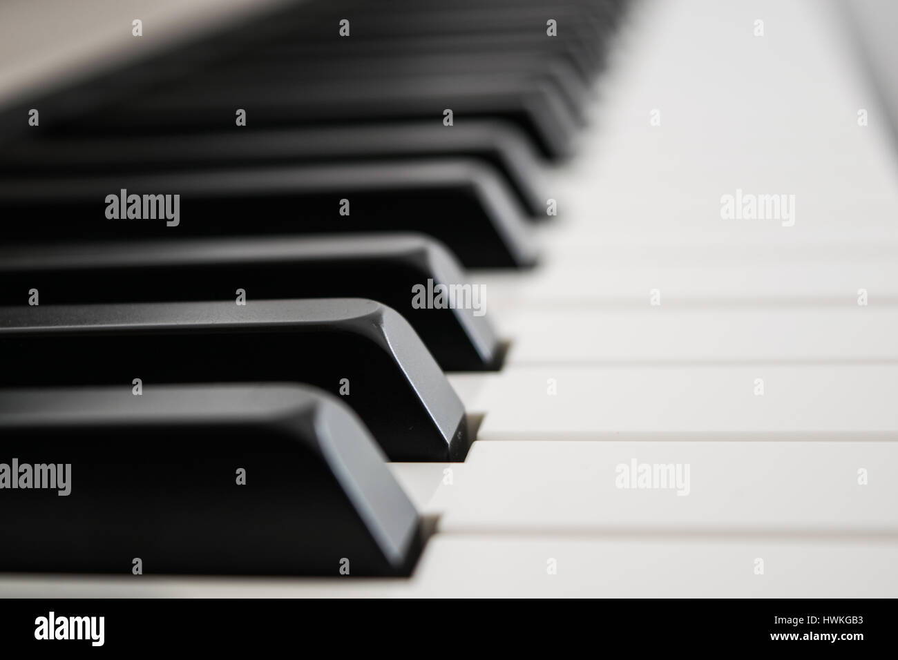 Piano keys side view Stock Photo - Alamy