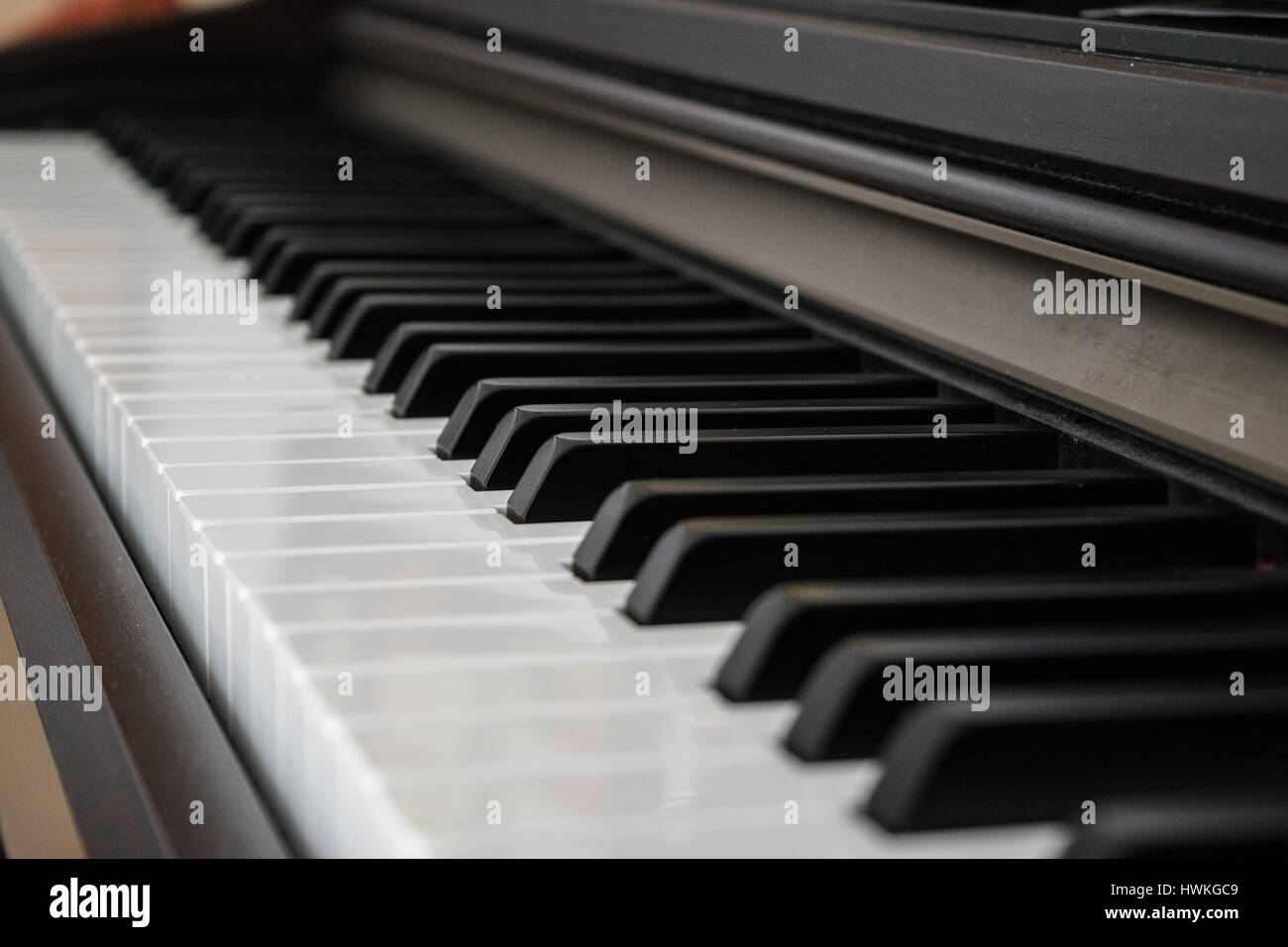 Piano keys side view Stock Photo - Alamy