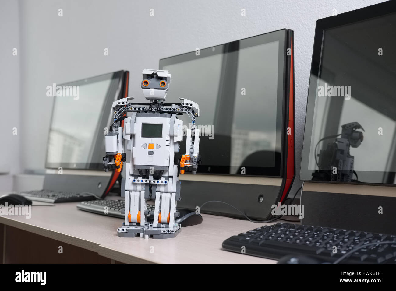 Programmed mechanic robot in laboratory Stock Photo - Alamy