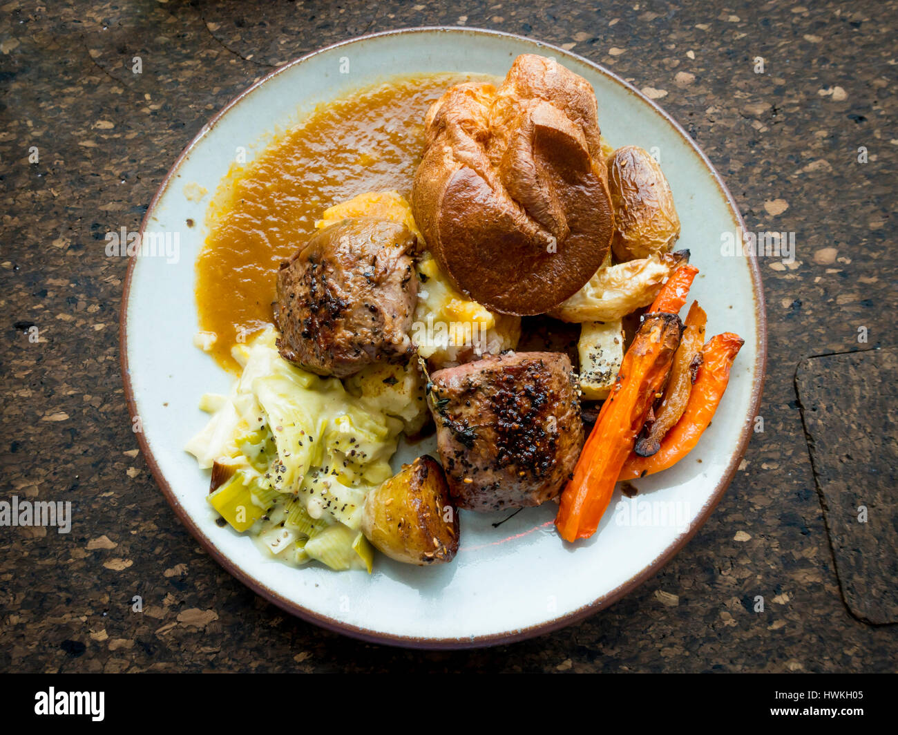 Sunday Lunch main course Lamb Cutlets Yorkshire pudding vegetables and ...