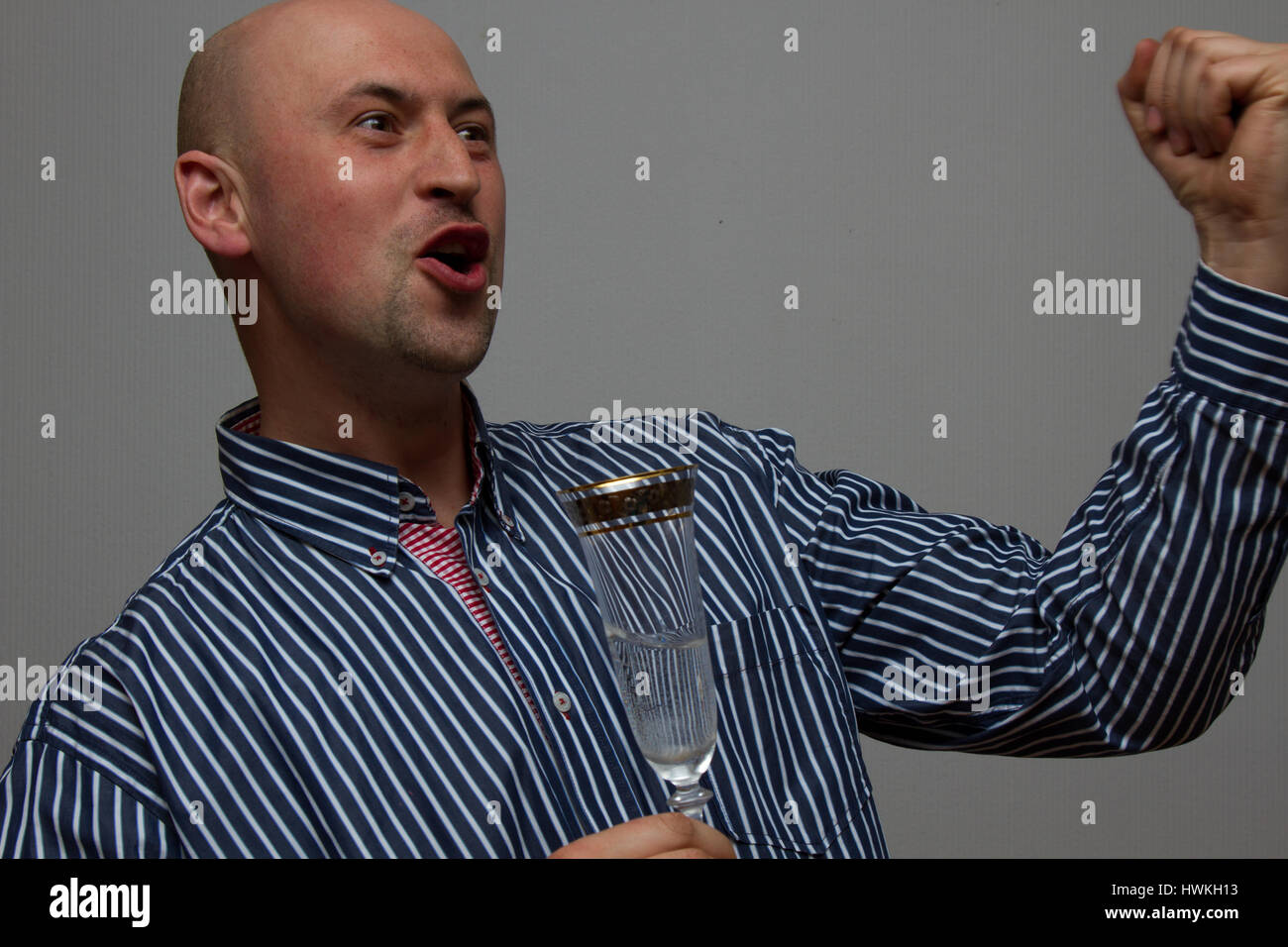 Happy drunk businessman Stock Photo - Alamy