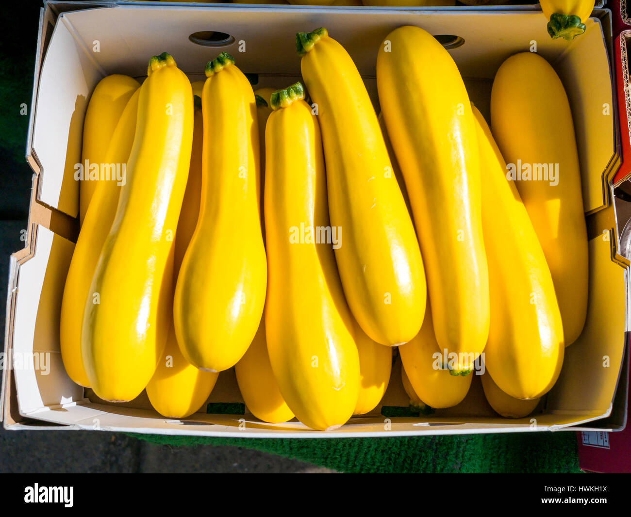 Yellow Courgettes for sale on a greengrocers shop exterior display ...