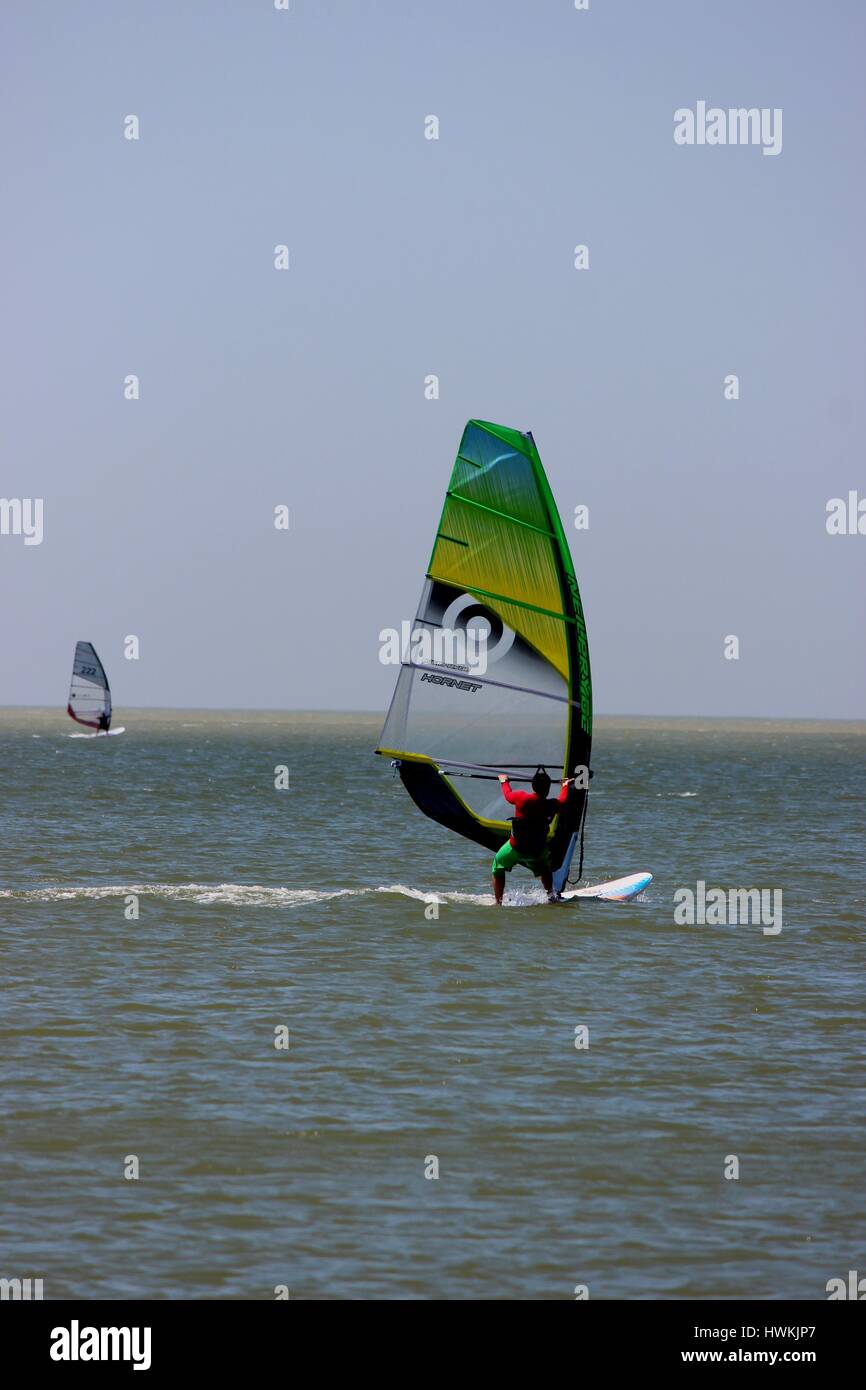 The competitions in sailing. Swimming on sails Stock Photo - Alamy