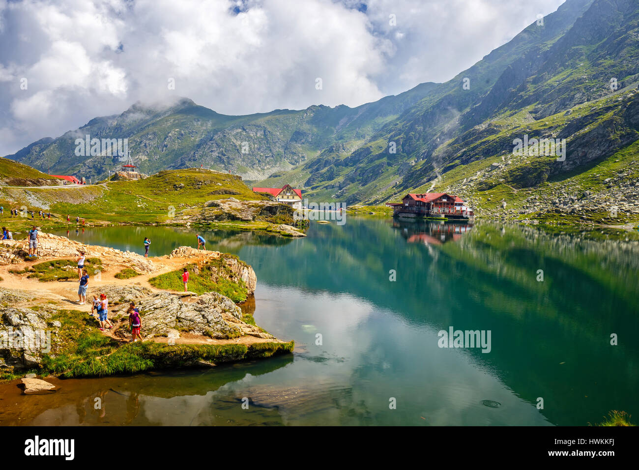 BALEA LAKE, ROMANIA - 21 JULY, 2014: Unidentified tourists enjoy the ...