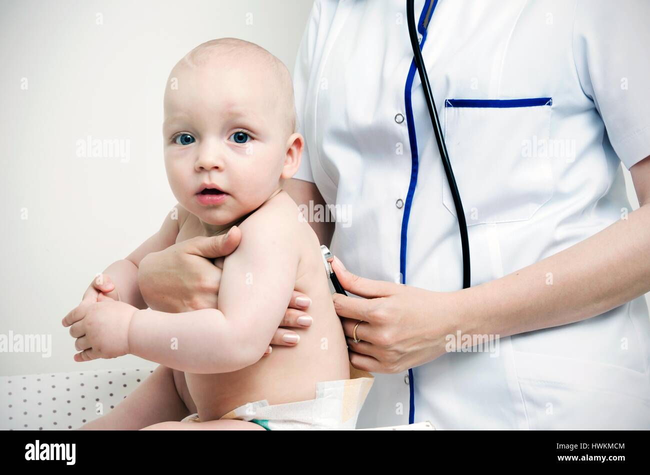 Little cute baby and doctor Stock Photo - Alamy