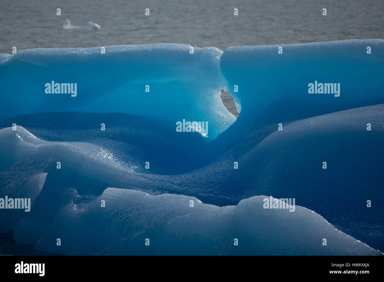 Spectacular blue iceberg floating on the Lake Argentino in the Los ...