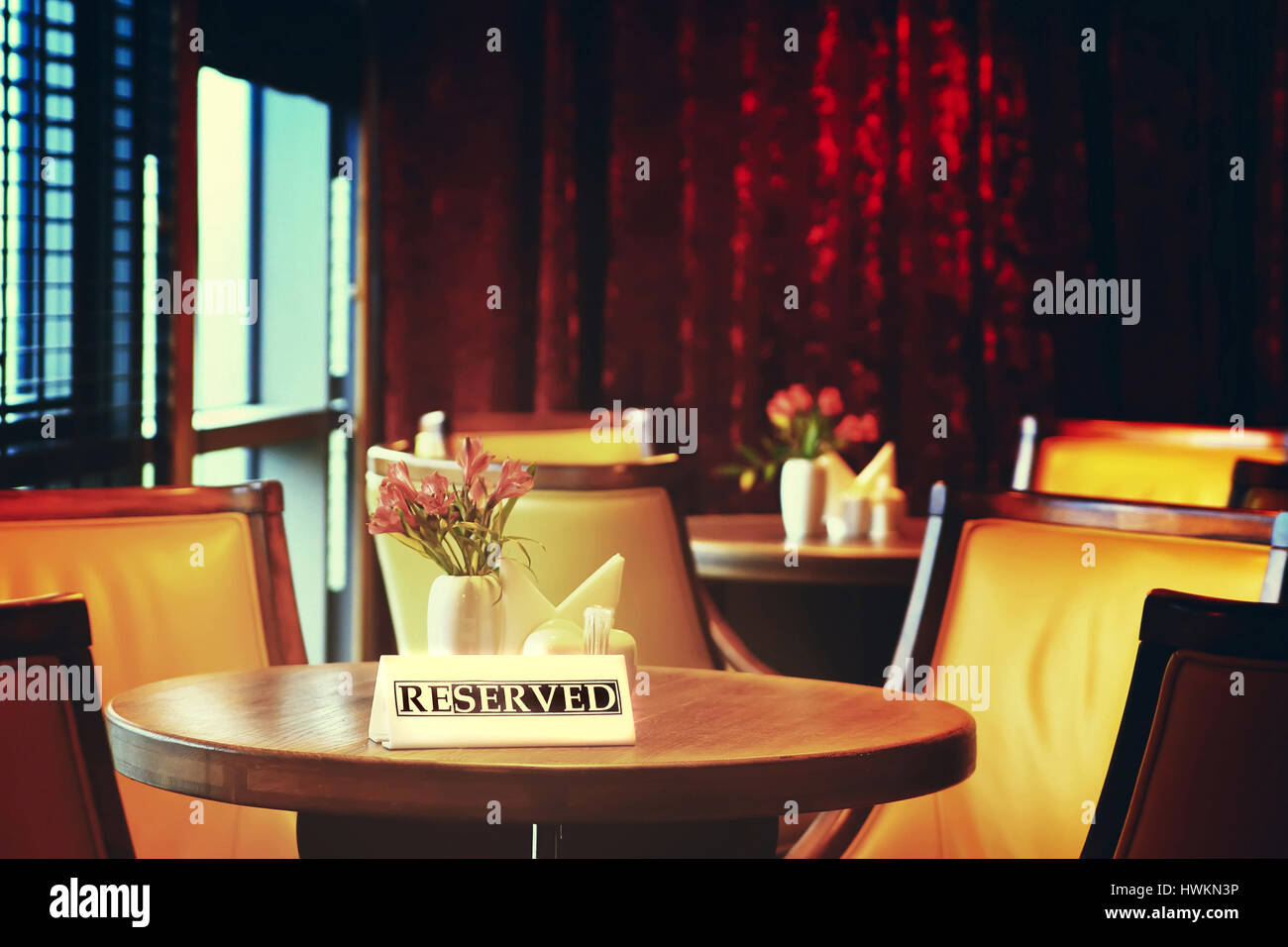 Reserved table close-up. Round wooden coffee table reserved. Relaxation ...