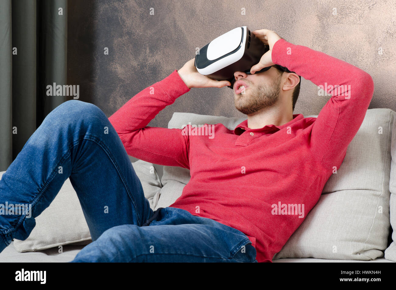 Man wears virtual reality glasses with smartphone inside. vr glasses ...