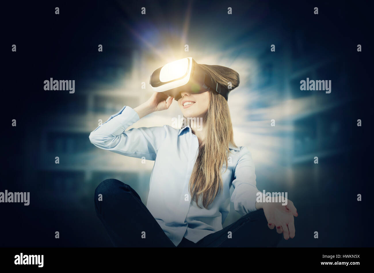 Woman wears virtual reality glasses with smartphone inside. vr glasses ...