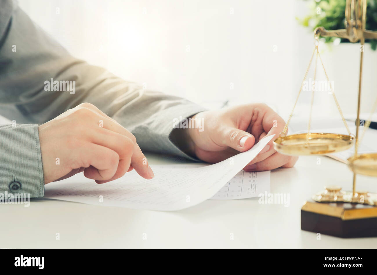 Scales justice in hands hi-res stock photography and images - Alamy