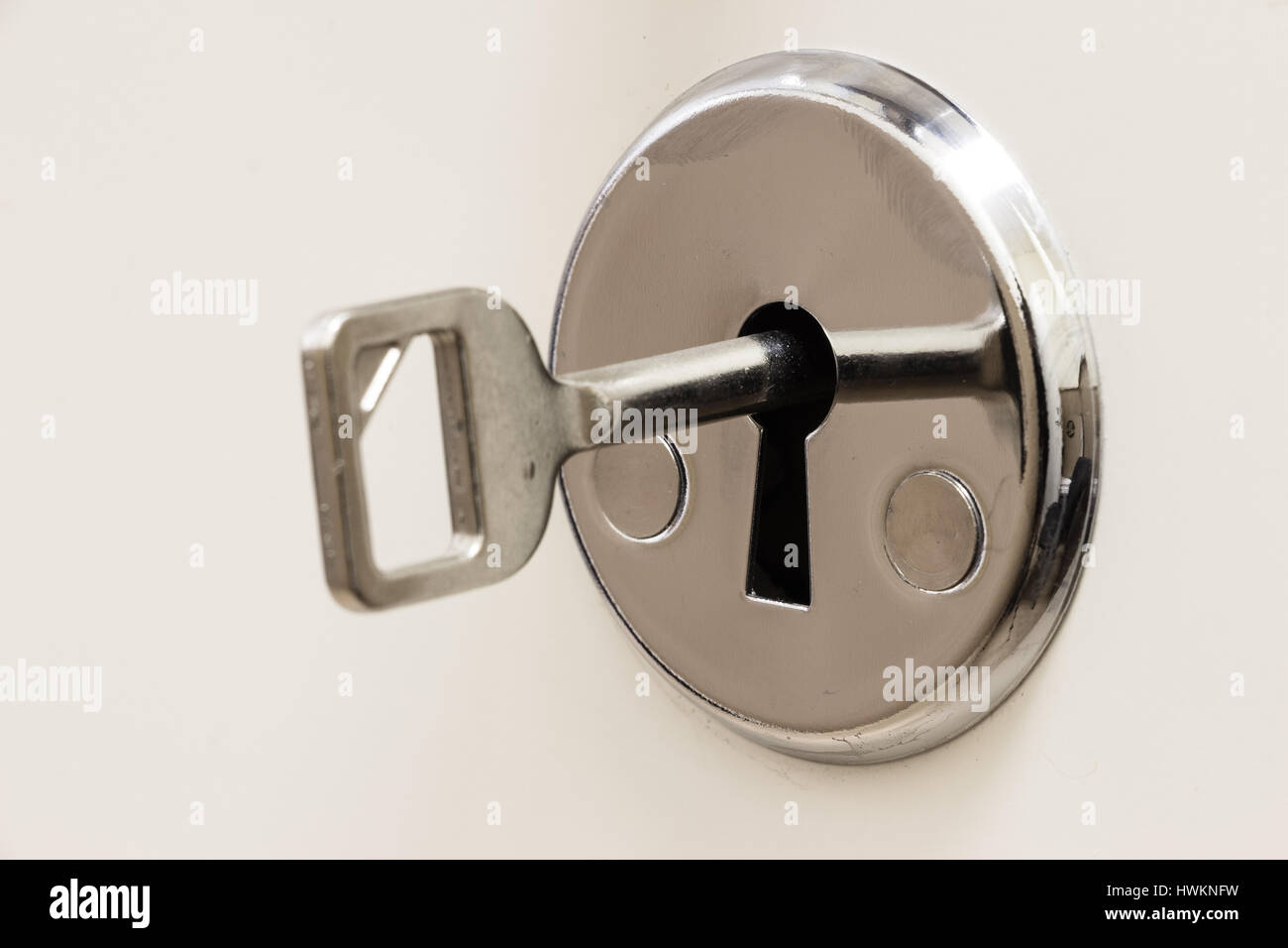 The key is inserted into the keyhole Stock Photo - Alamy