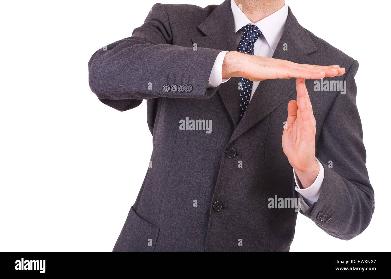 Businessman showing time out sign with hands Stock Photo - Alamy