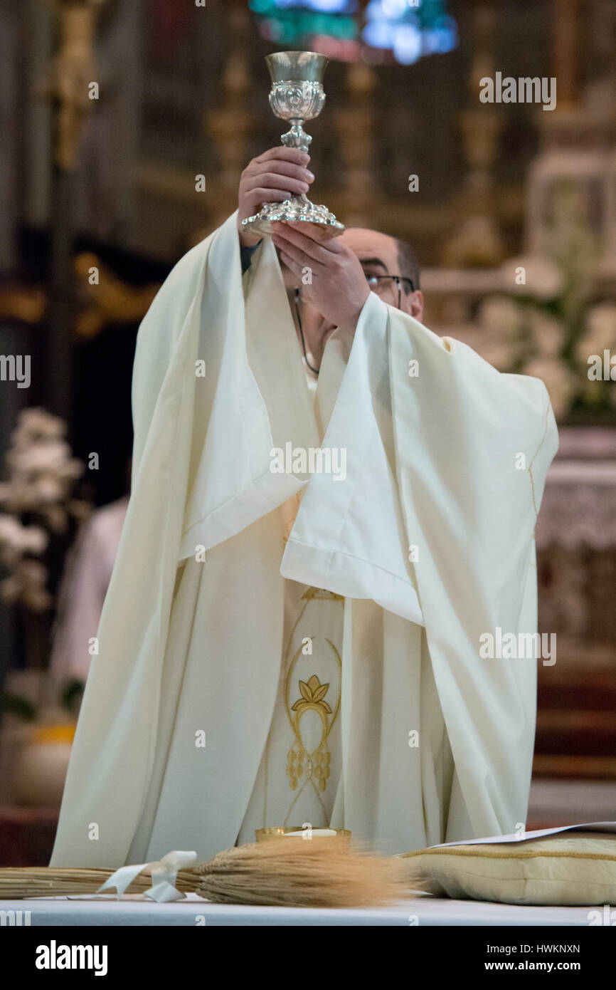 Goblet for the offertory of the Communion during the Mass Stock Photo ...