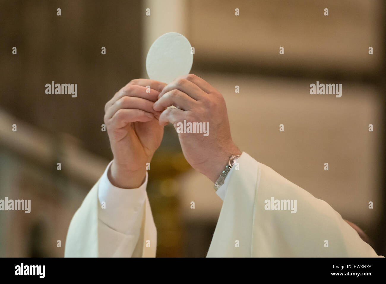 The holy bread of the Communion during the Mass Stock Photo - Alamy