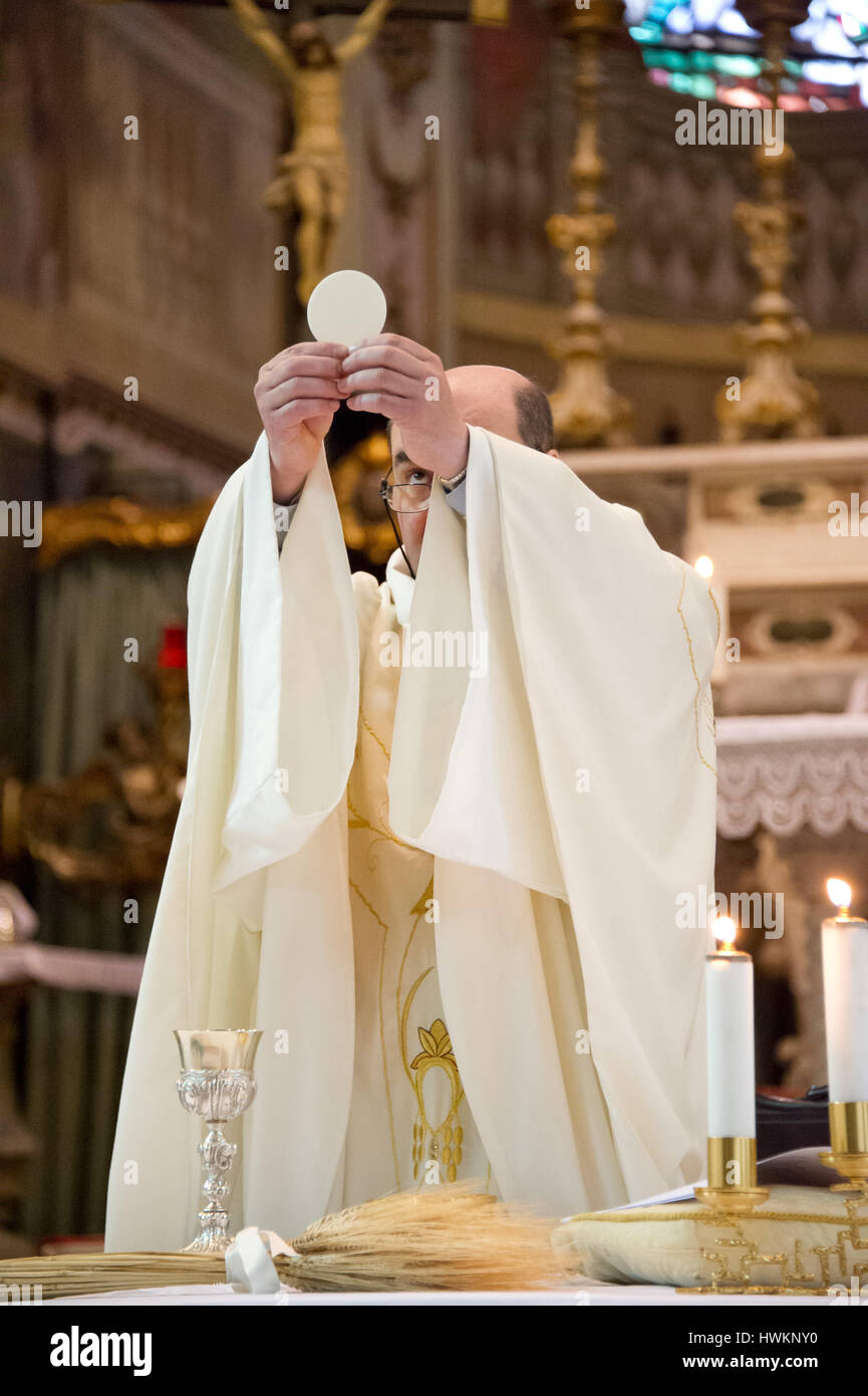 The holy bread of the Communion during the Mass Stock Photo - Alamy