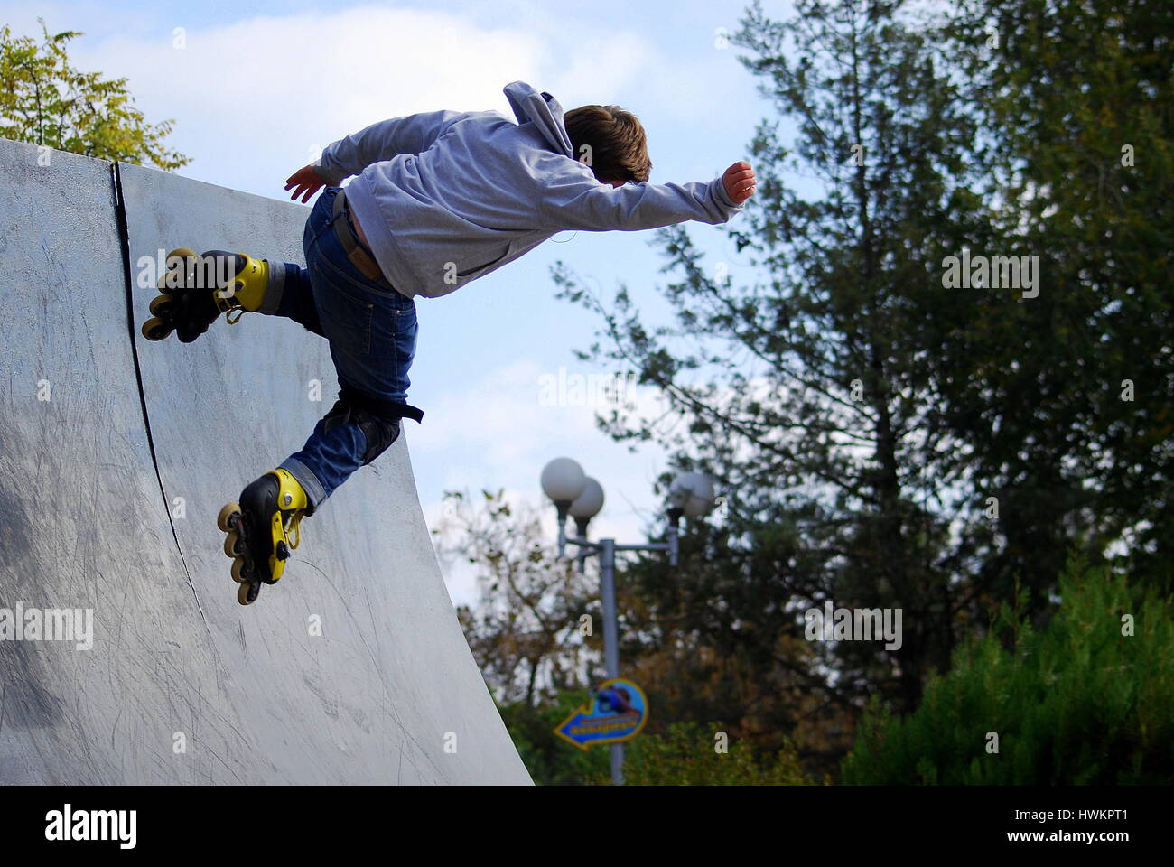 The ride on the rollers. Training for riding on roller skates Stock ...
