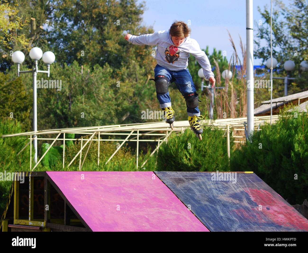 The ride on the rollers. Training for riding on roller skates Stock ...