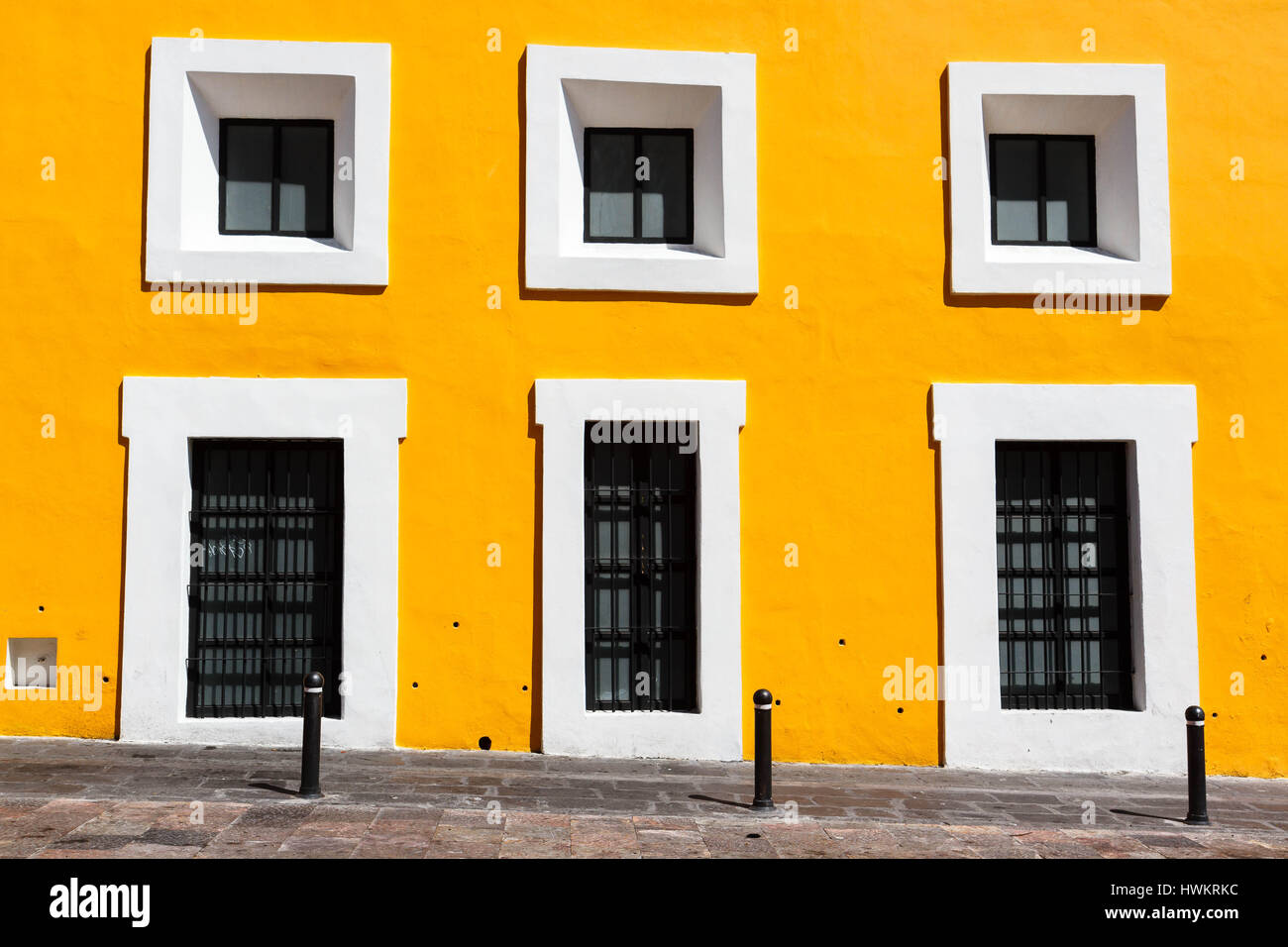 Square and rectangular windows on a bright yellow background Stock ...