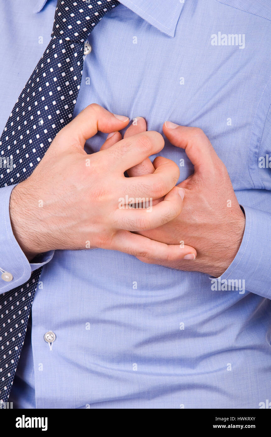 Businessman with heart attack Stock Photo - Alamy