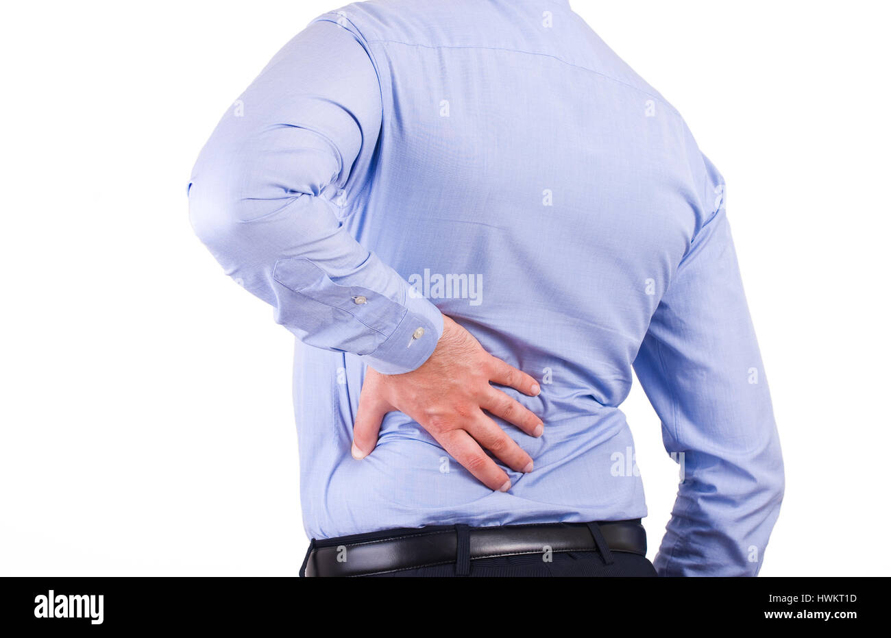 Businessman with aching back Stock Photo - Alamy