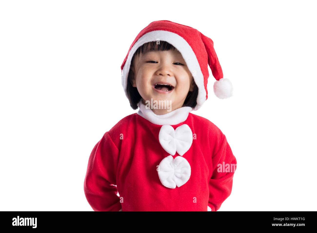 Happy Asian Chinese little girl wearing santa claus costume in isolated ...
