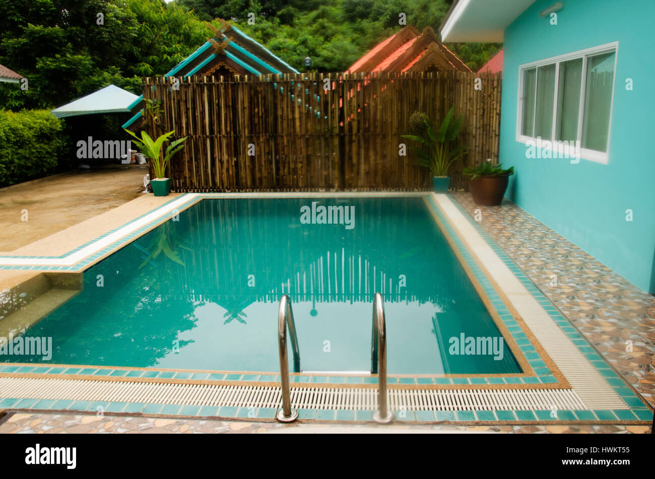 Small swimming pool at inside of local resort for customer play Stock ...