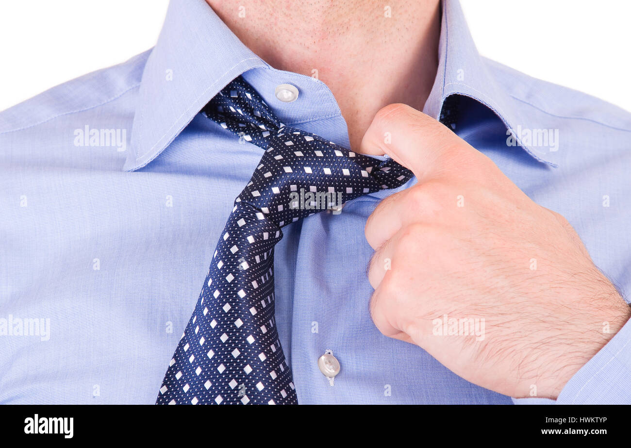 Businessman loosening necktie hi-res stock photography and images - Alamy