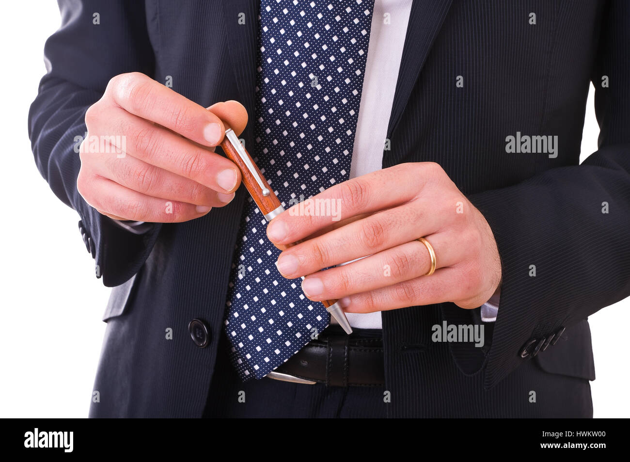 Business man holding a pen Stock Photo - Alamy