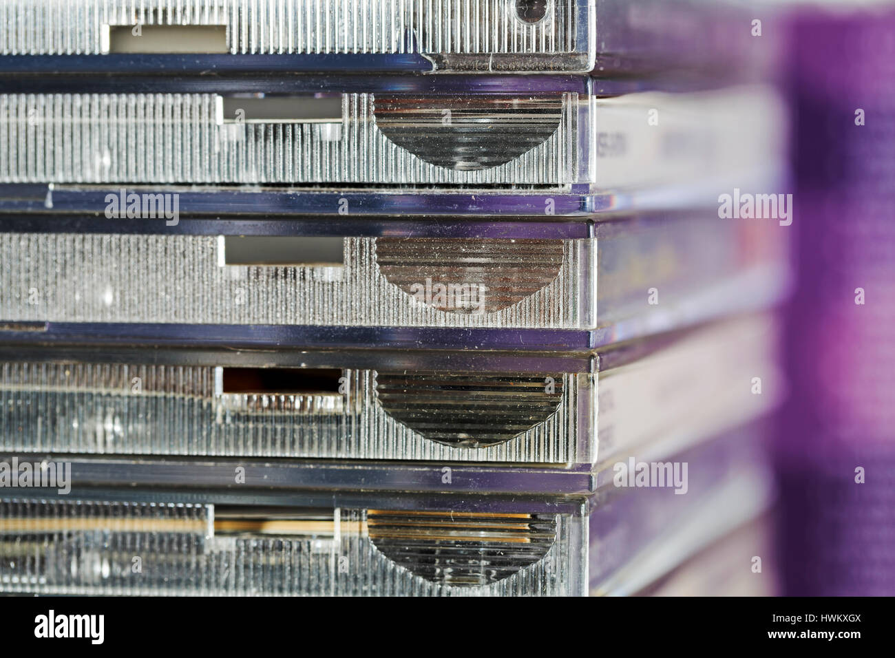 The stack of used CD boxes creates a background Stock Photo - Alamy