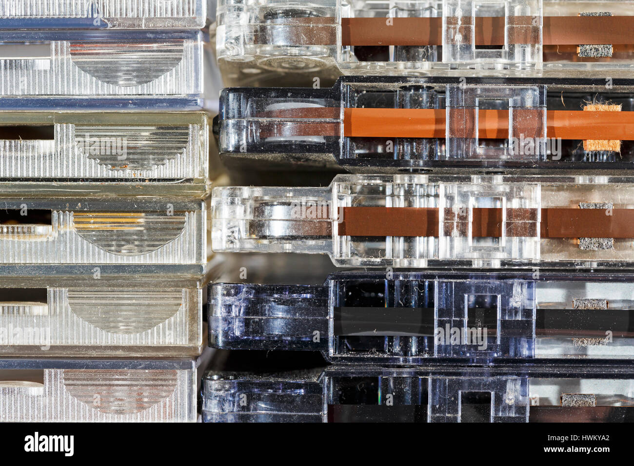 CD covers and Compact Cassettes arranged horizontally in a stack next ...