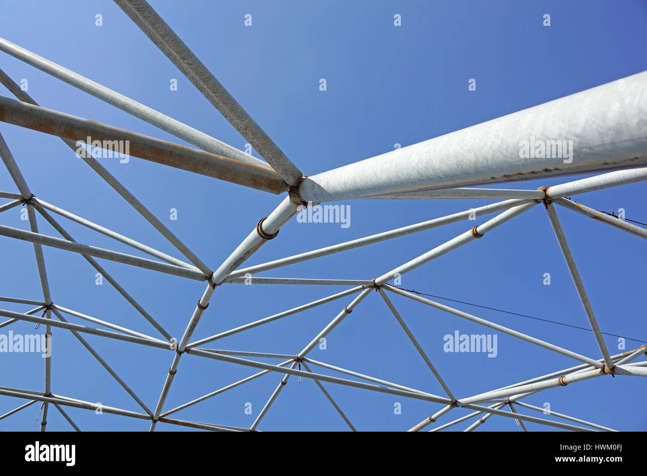 metal structure with blue sky background Stock Photo - Alamy
