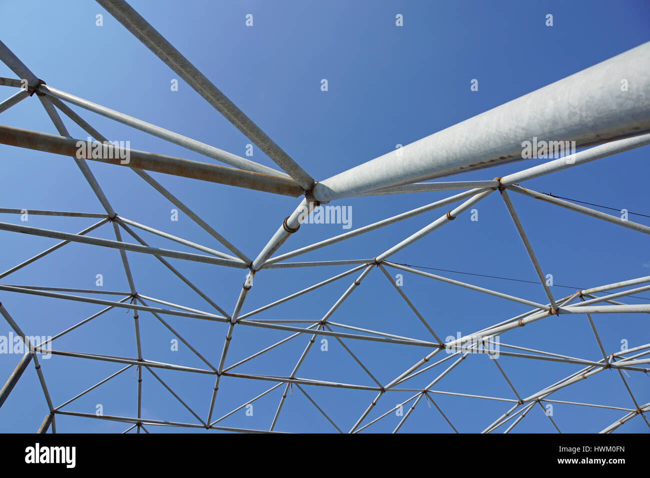 metal structure with blue sky background Stock Photo - Alamy