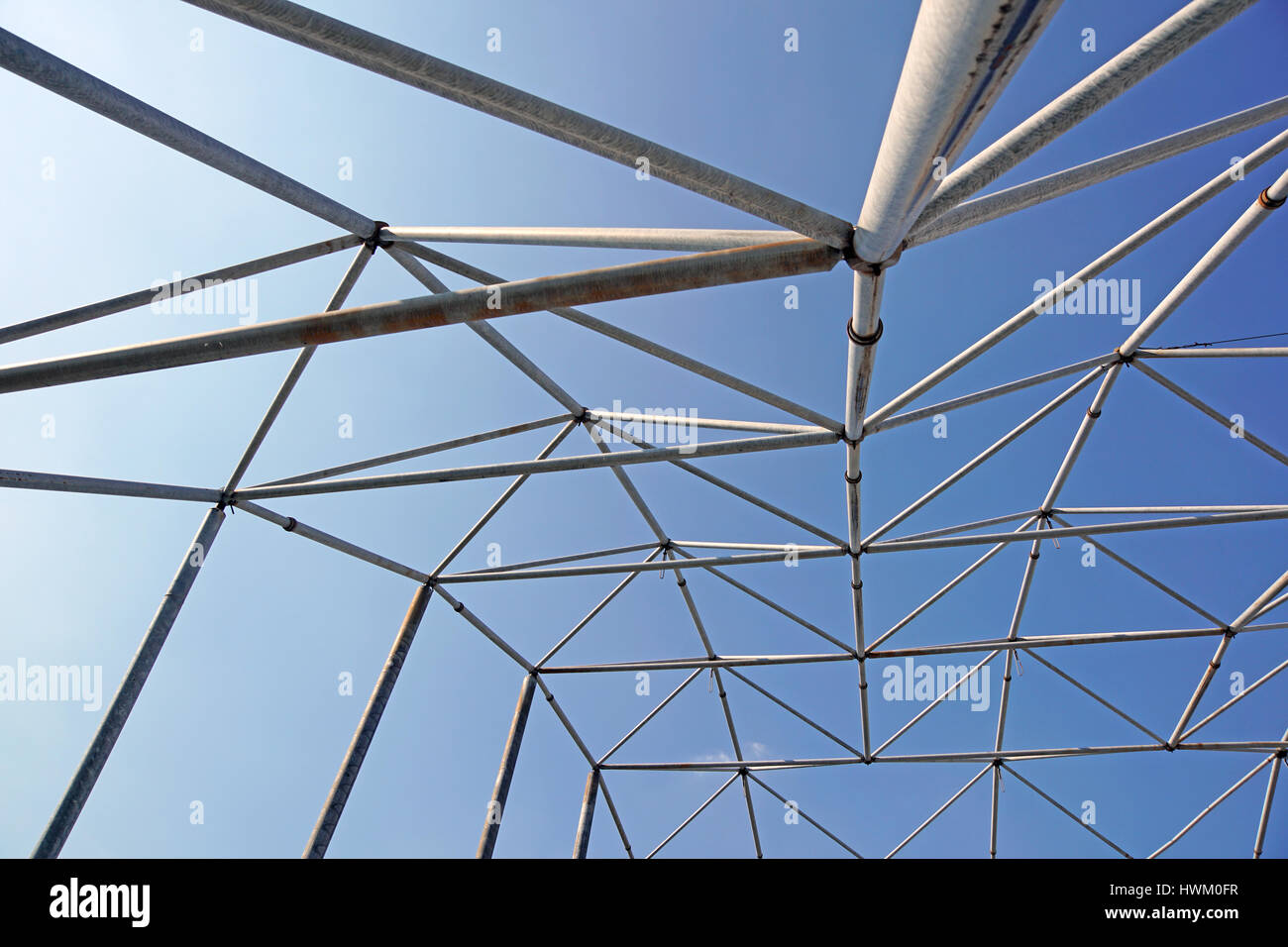 metal structure with blue sky background Stock Photo - Alamy